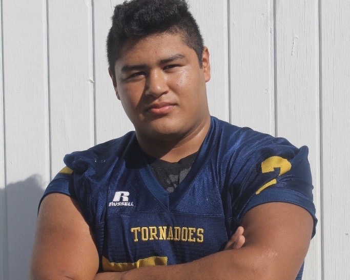 Pompano Beach football player tackling obstacles on and off the field ...