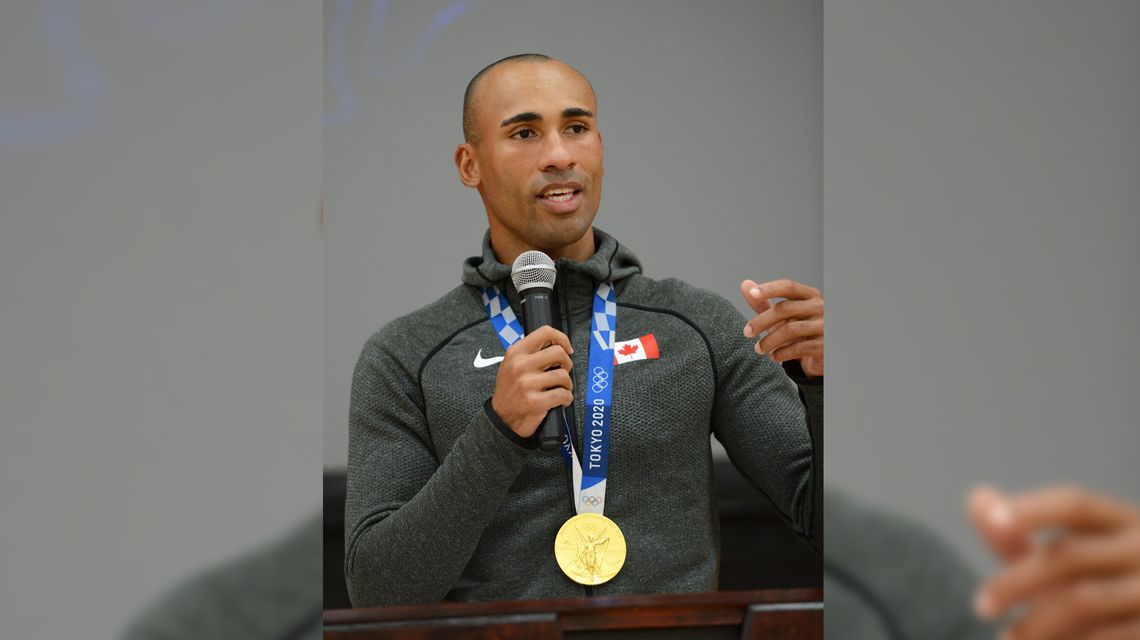Olympic decathlon gold medalist Damian Warner speaks to students about ...